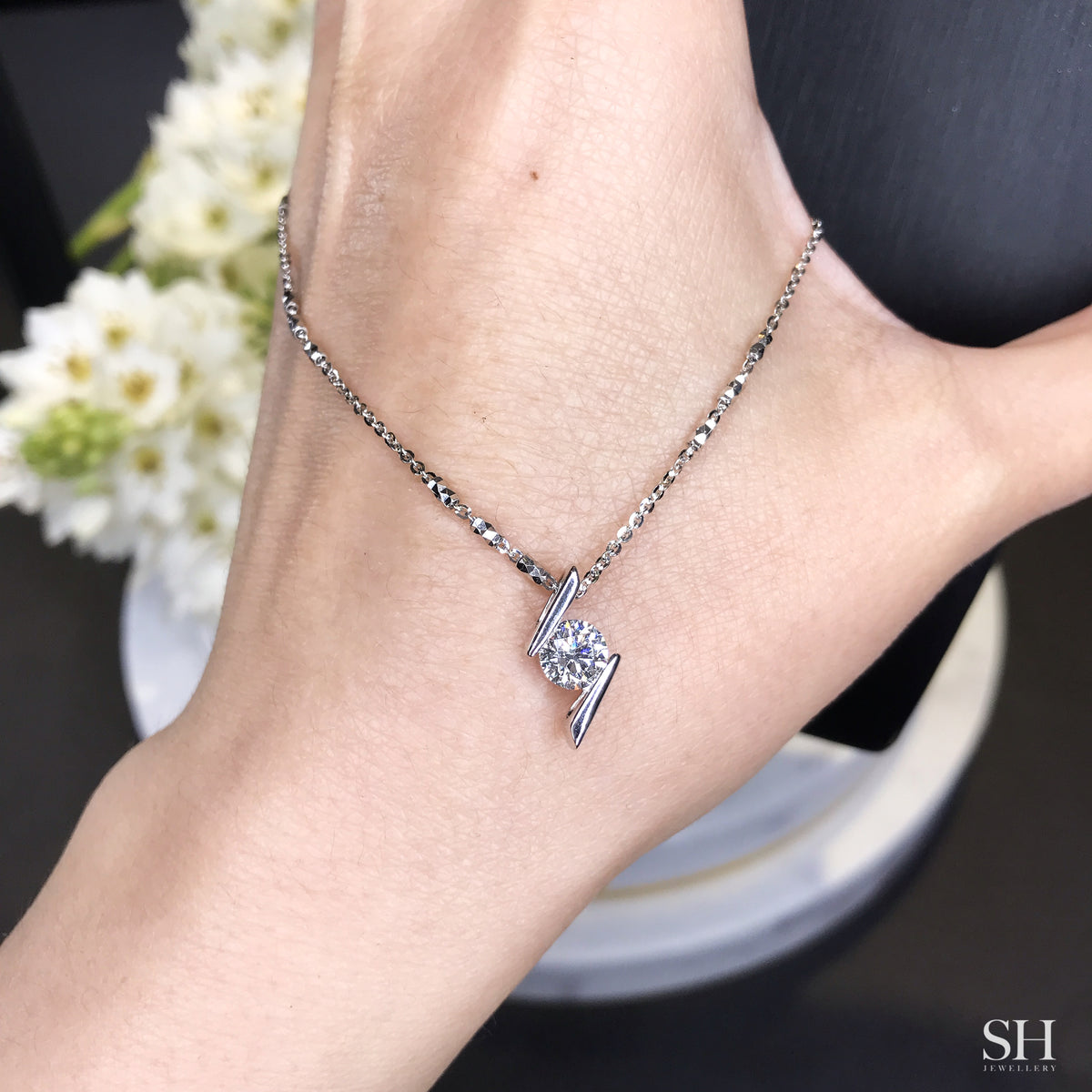 Diagonal floating diamond pendant | SH Jewellery